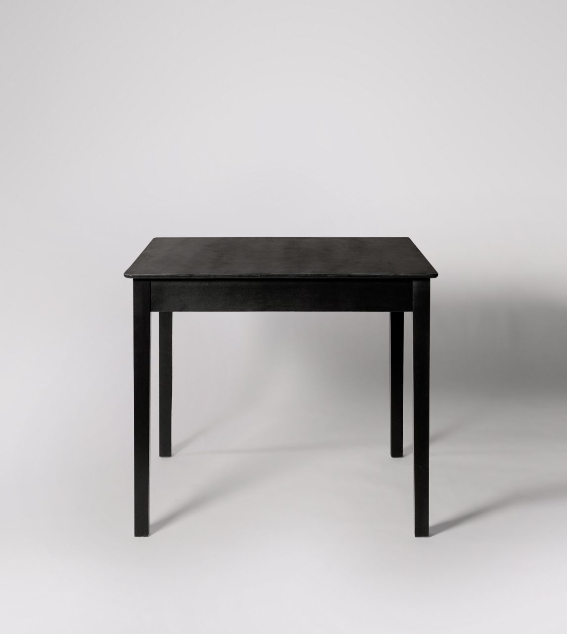 Duval Classic Four-seater Dining Table in Black Mango Wood | Swoon