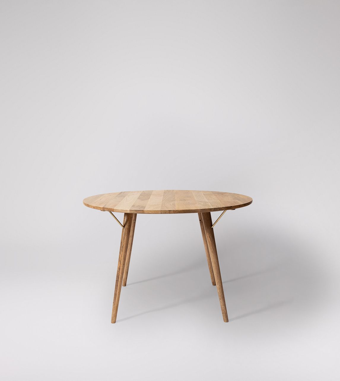 Kaiden Round Dining Table in Natural Mango Wood & Brass. | Swoon