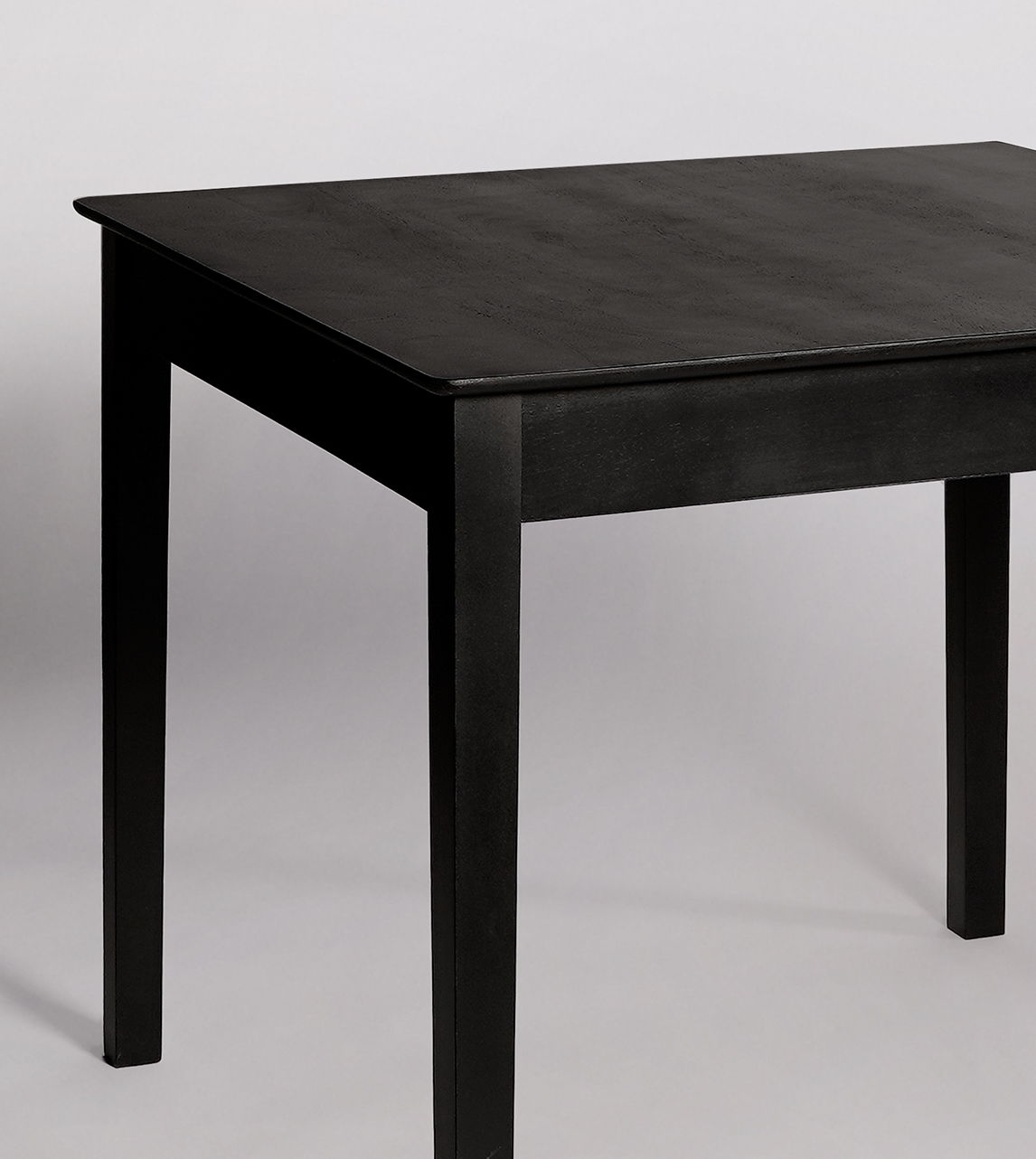 Duval Classic Four-seater Dining Table in Black Mango Wood | Swoon