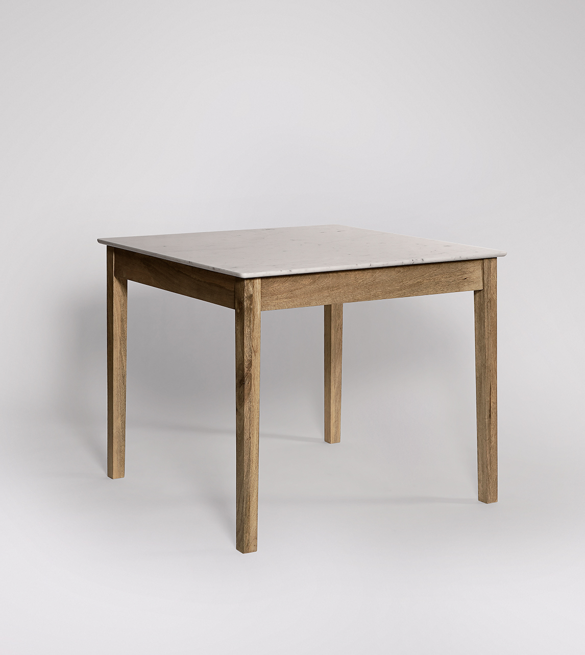 Duval Classic Four-seater Dining Table in Natural Oak-stained Mango Wood & White Marble | Swoon